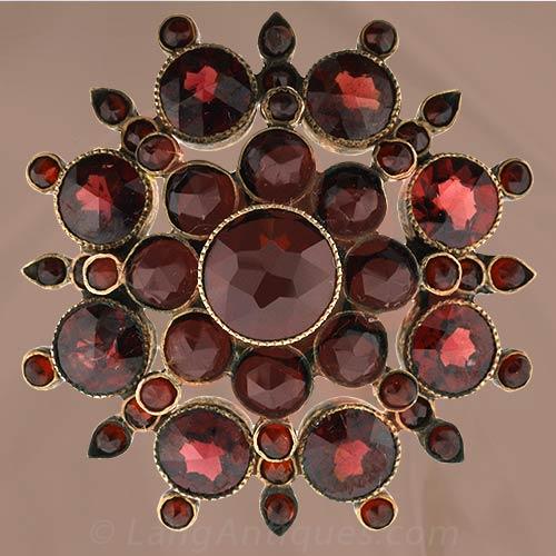 Garnet Starburst Pin